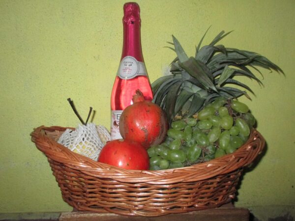 Beautiful Basket of 3 Kg Sesonal Fruits with a bottle of non-alcoholic ...